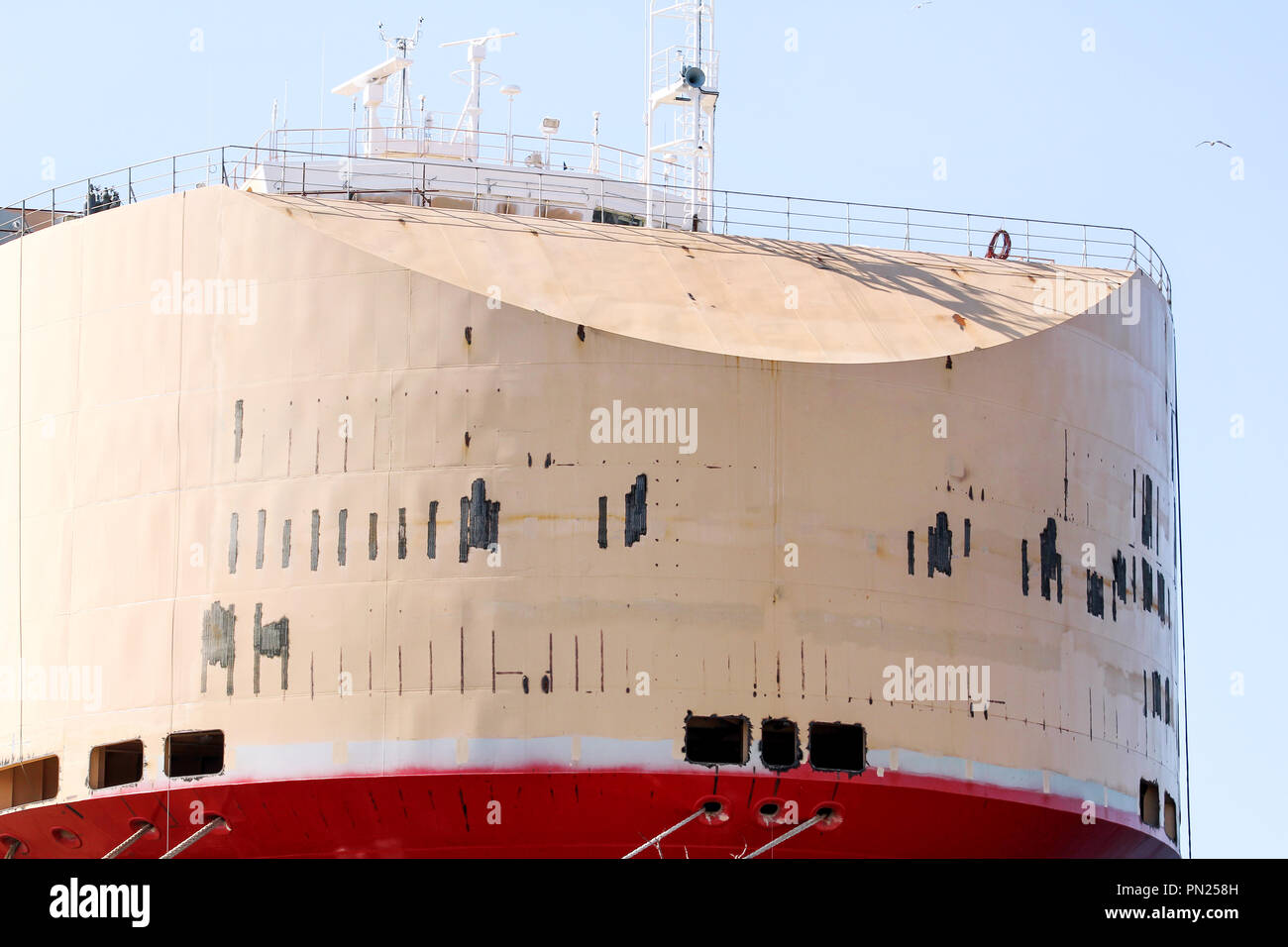 Part of a large tanker ship. Perspective view of a large rusty oil ...