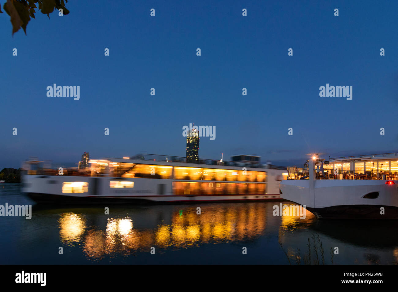 Wien, Vienna: river Donau (Danube), cruise ship in front of Donaucity ...