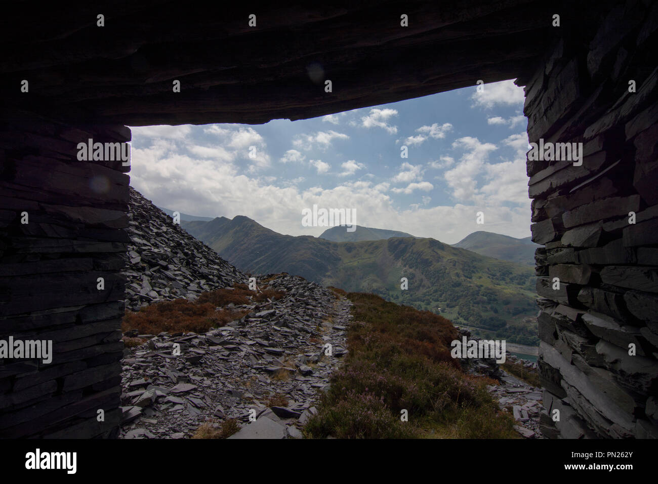Looking through Slate barn towards Snowdon Stock Photo - Alamy