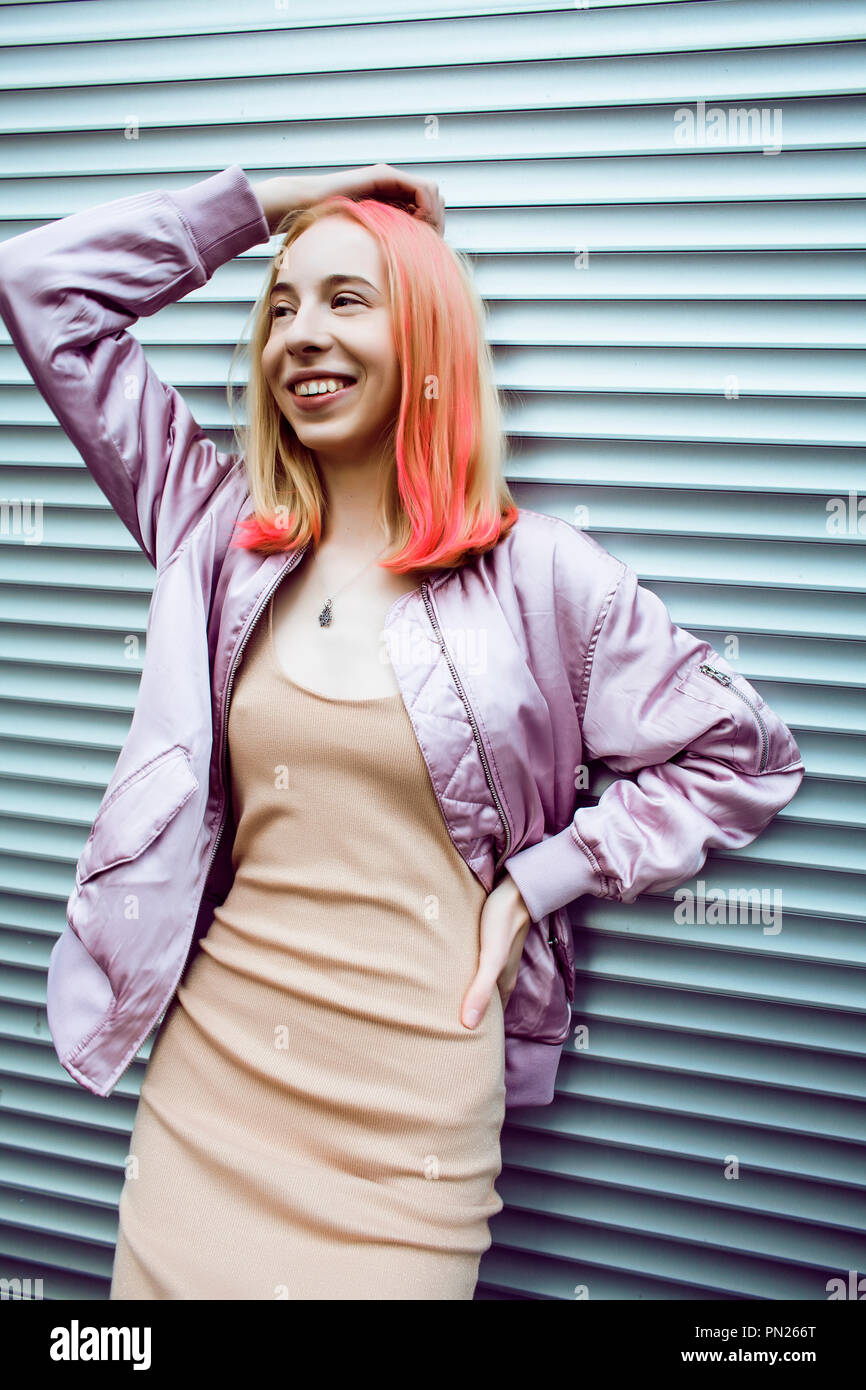 young pretty fashion dressed blong teenage girl posing friendly Stock ...