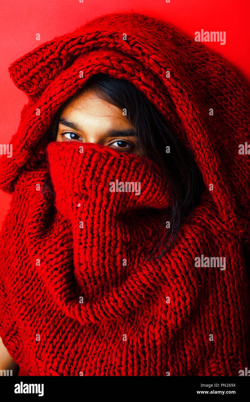 young pretty indian girl in red sweater posing emotional close u Stock ...