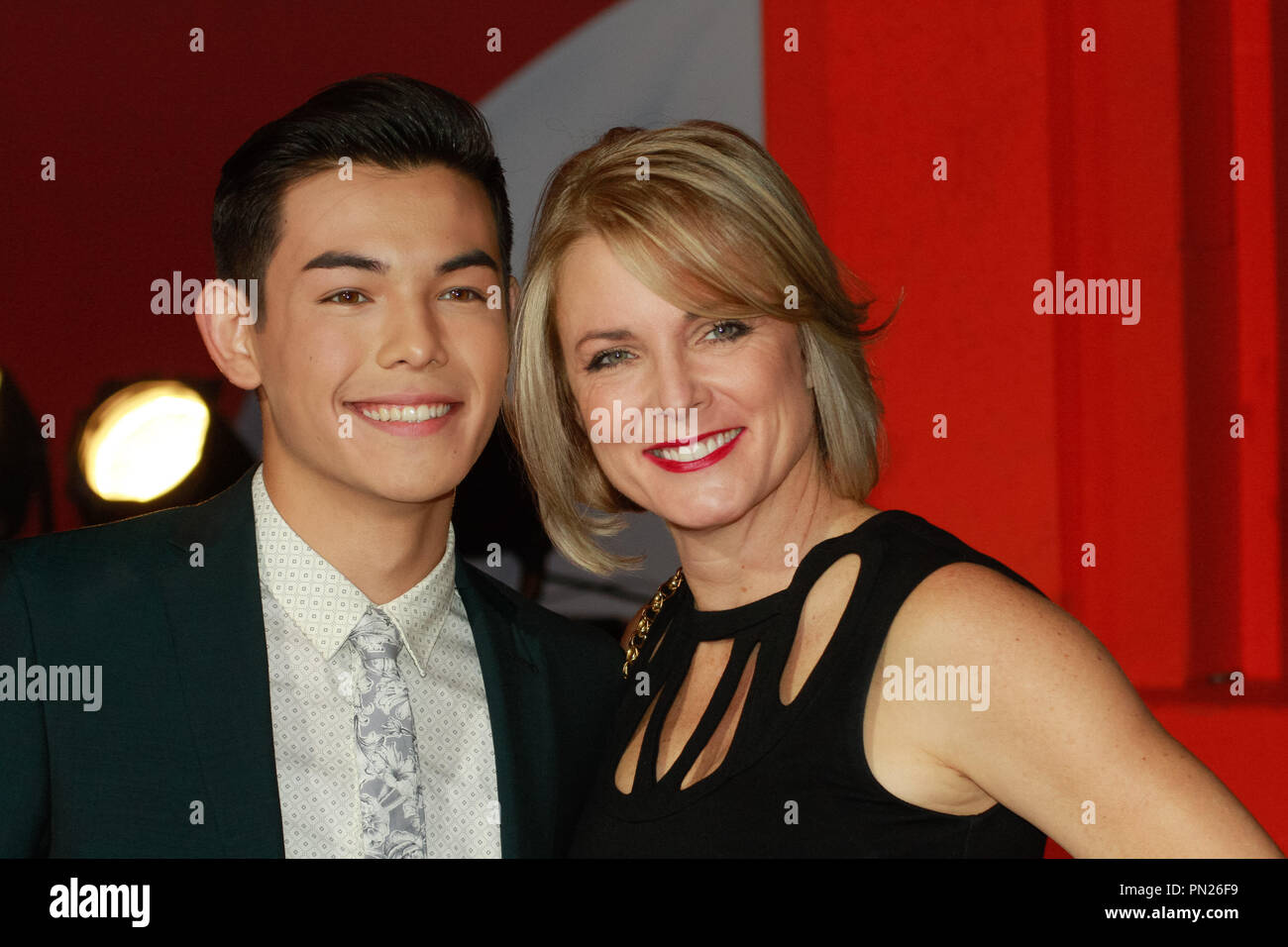 Ryan Potter and Mother at the Disney premiere of "Big Hero 6" held at ...