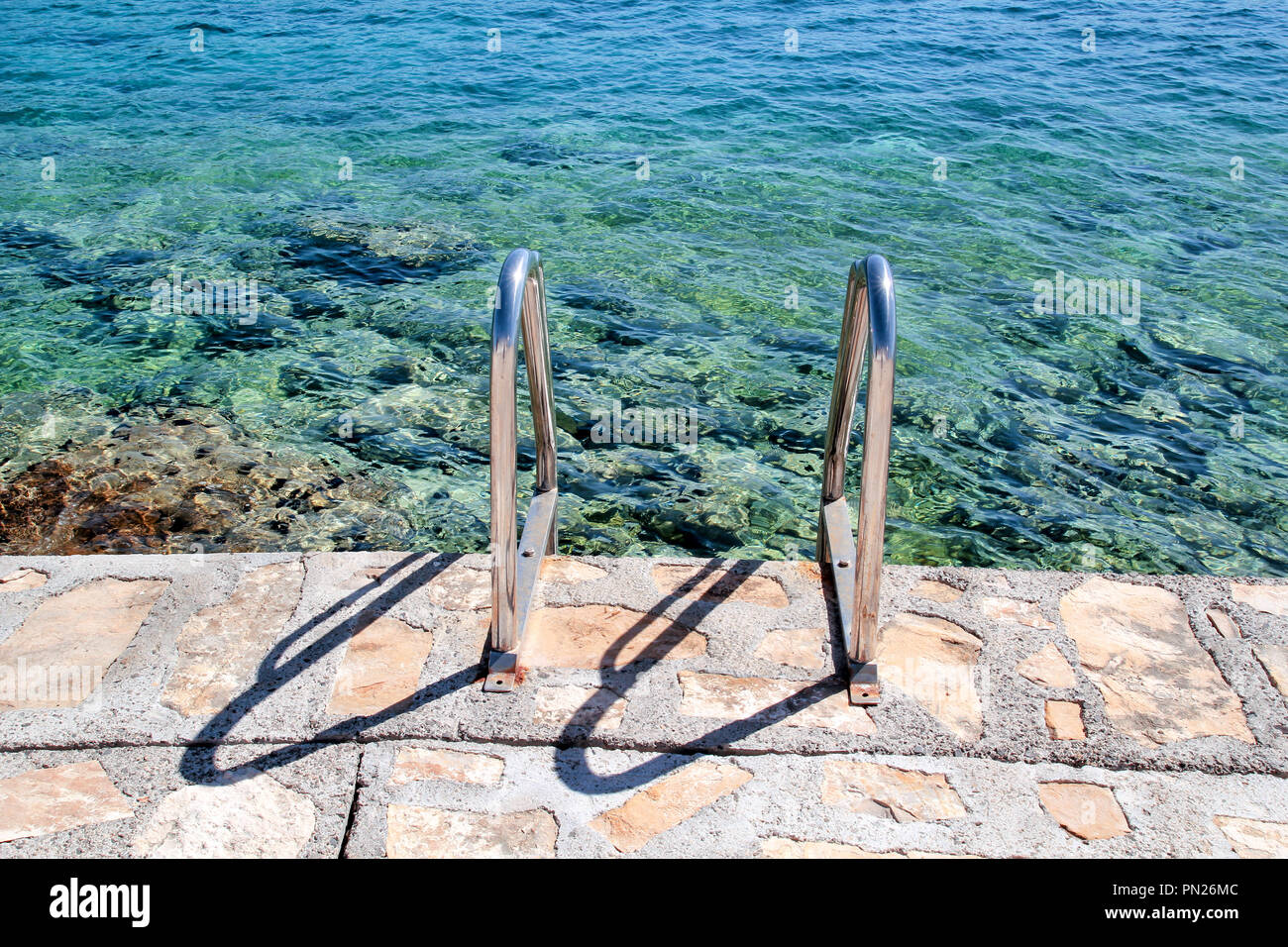 Handrail swimming hi-res stock photography and images - Alamy