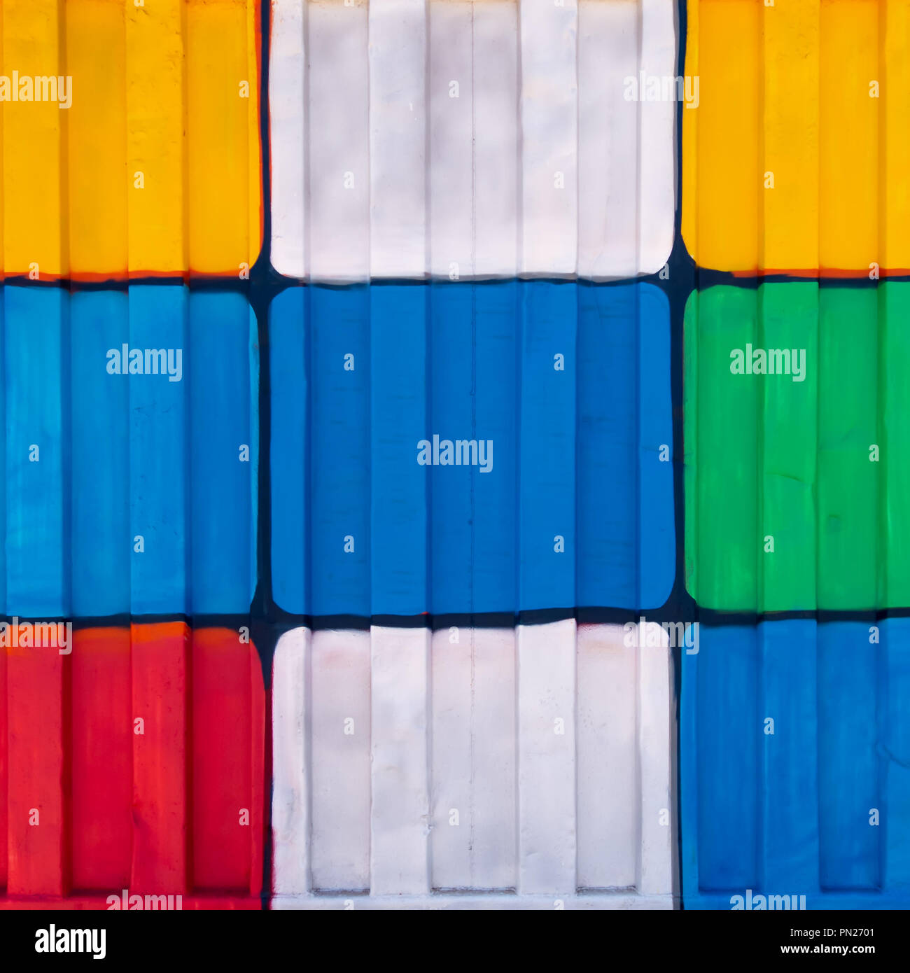 Metal container, painted in different colors. Blue, green, white ...