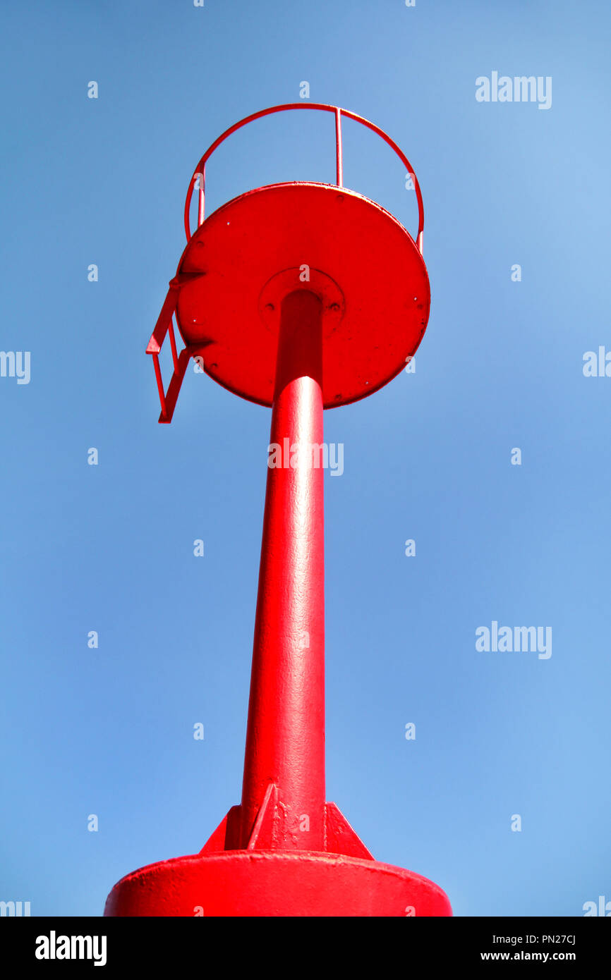 Red lighthouse isolated with blue sky background Stock Photo - Alamy