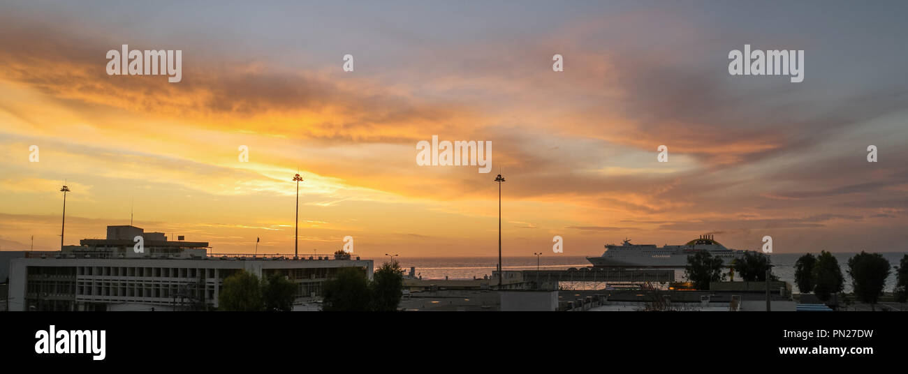 Sky dark grey clouds horizon yellow sunset glow background view hi-res ...