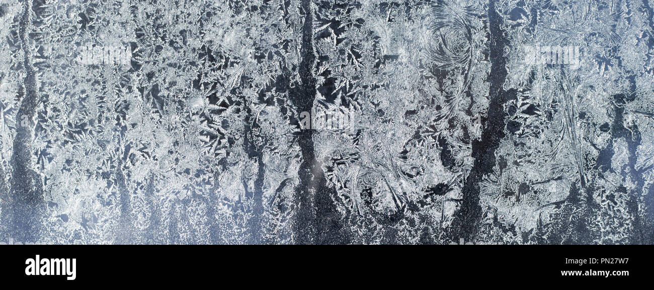 Frosty glass ice background, natural beautiful snowflakes. Frost ice ...