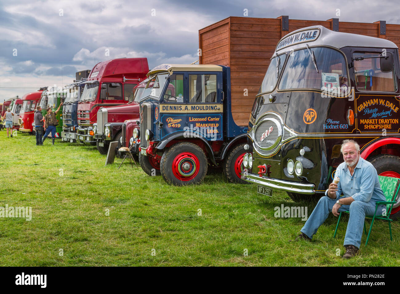 A line up of old lorries at a show Stock Photo - Alamy