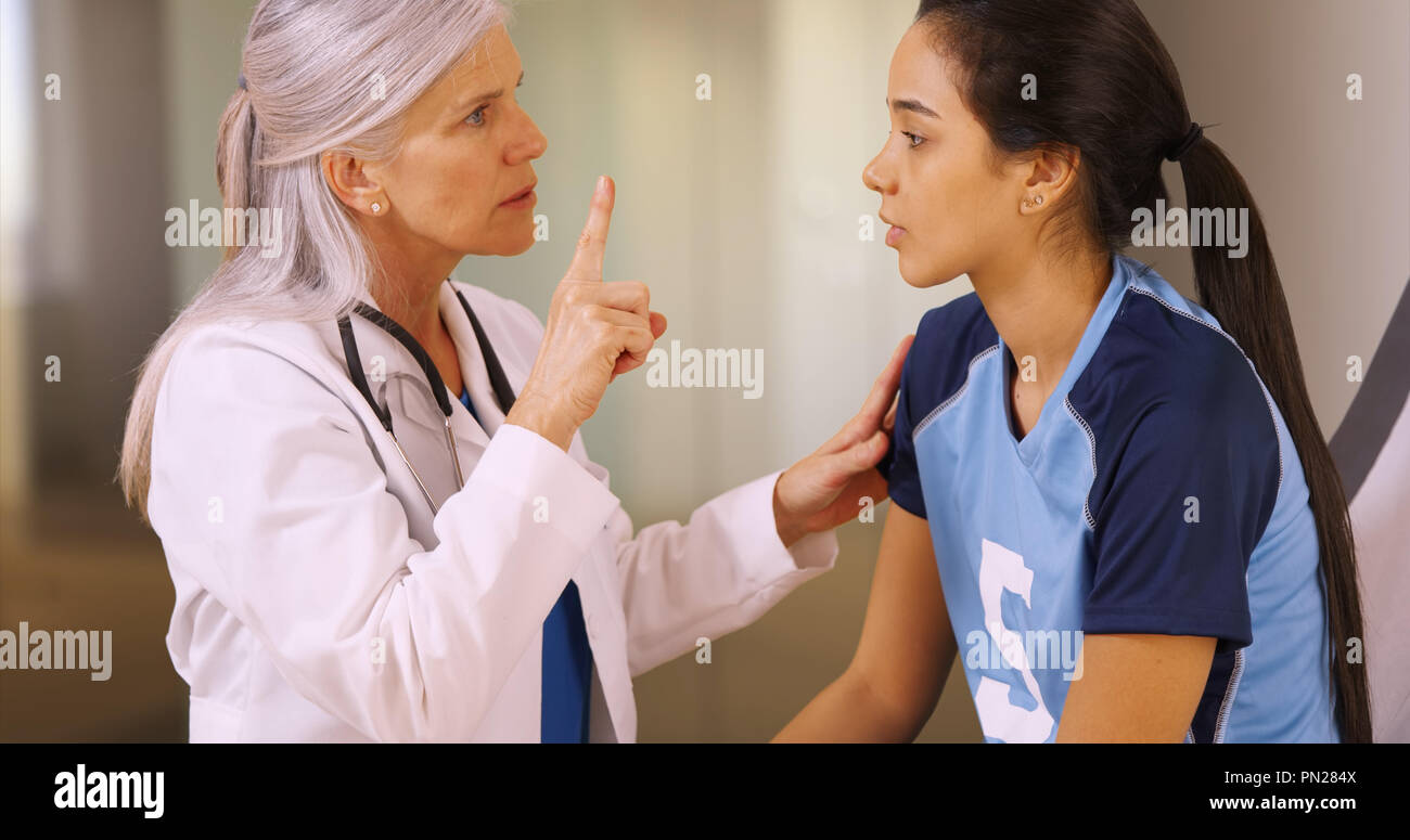 An injured soccer player is tested for a concussion Stock Photo - Alamy