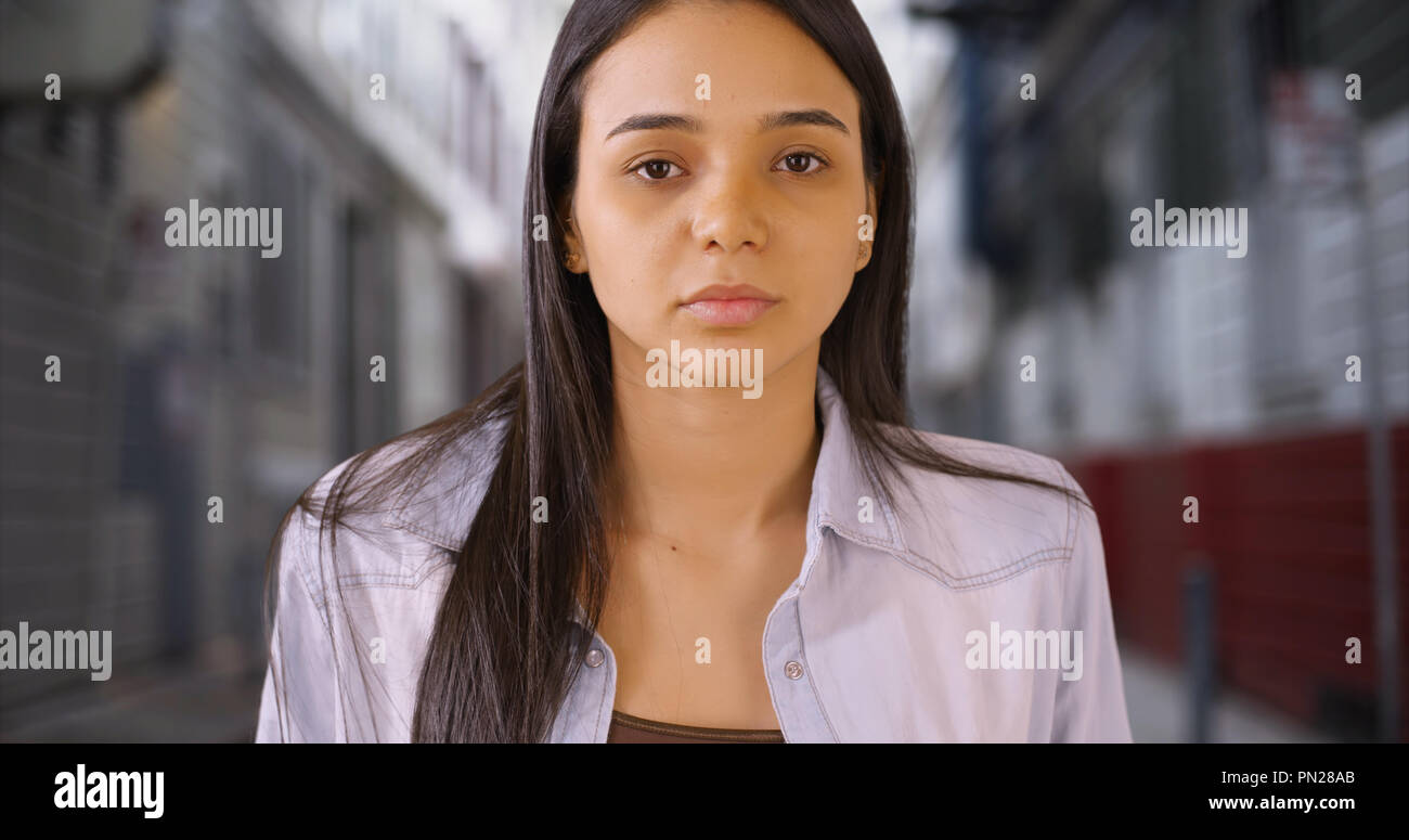 A young girl dramatically stares into the camera Stock Photo - Alamy