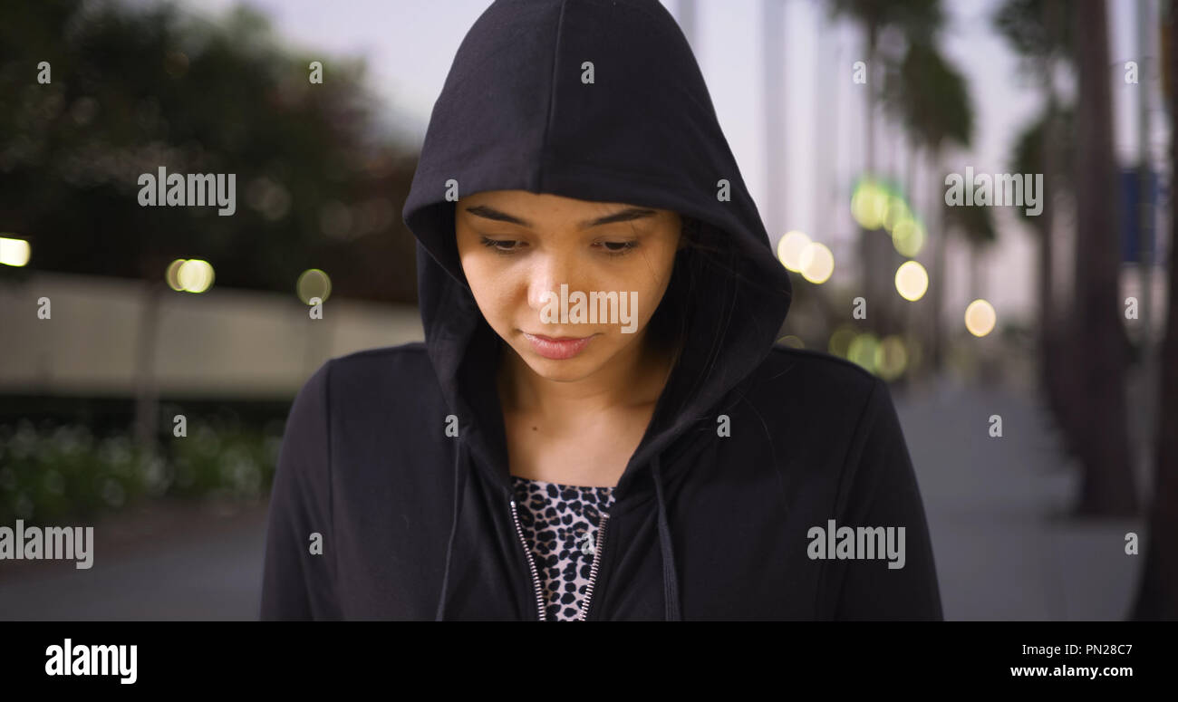 A depressed young girl poses for a portrait Stock Photo - Alamy