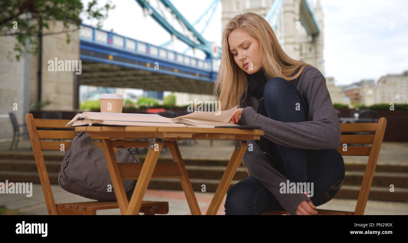 White exchange student studying near Tower Bridge in London UK Stock ...