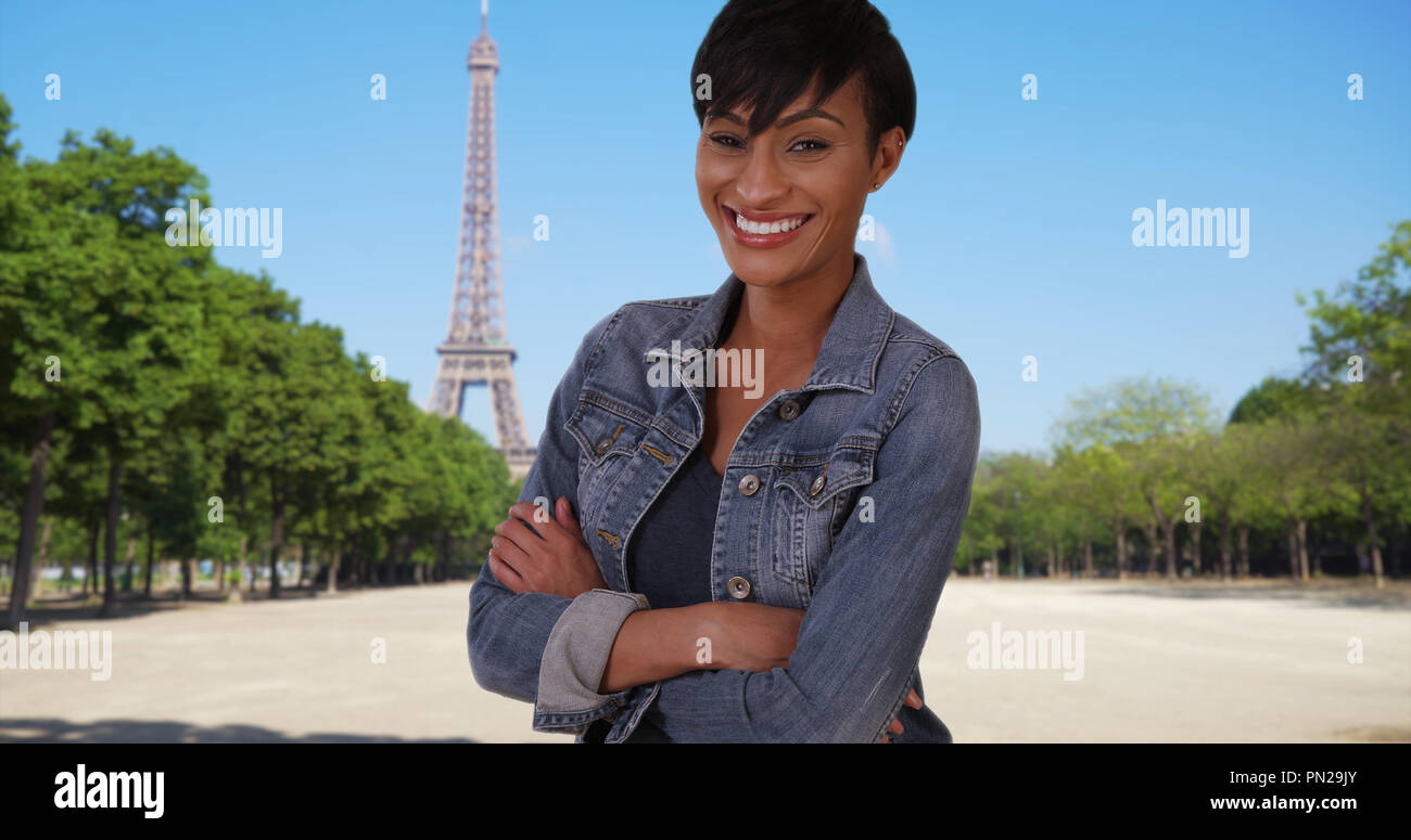 Eiffel tower with african model hi-res stock photography and images - Alamy