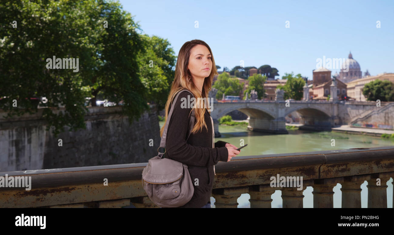 Caucasian girl in Rome using map on cellphone Stock Photo - Alamy