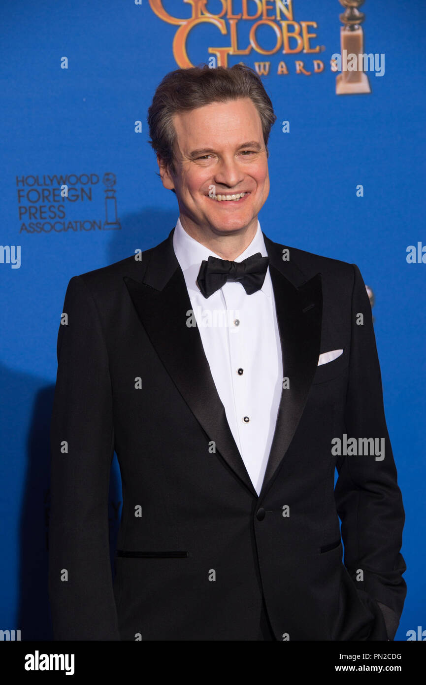 Colin Firth poses backstage in the press room at the 72nd Annual Golden ...