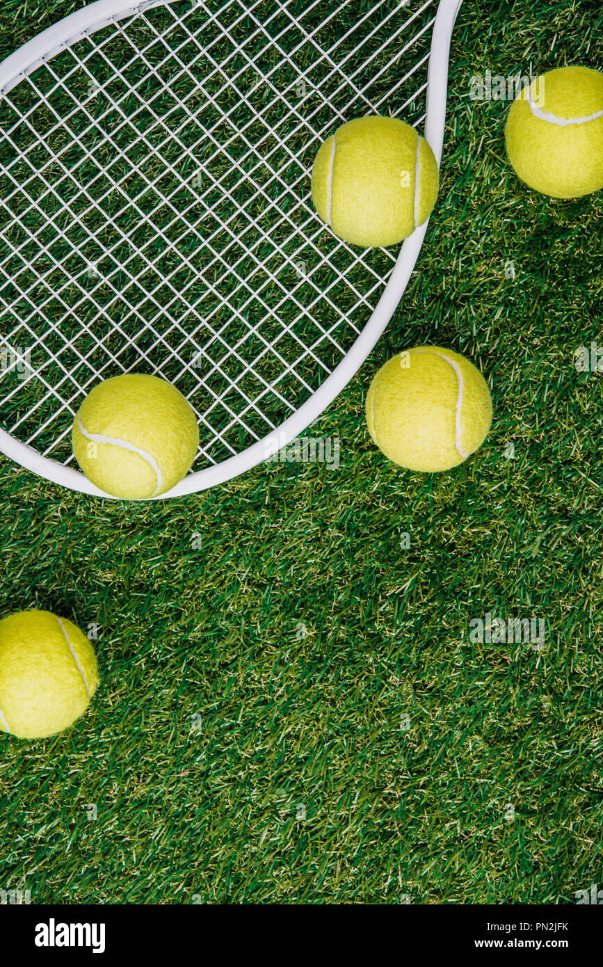 top view of tennis equipment of green grass Stock Photo - Alamy