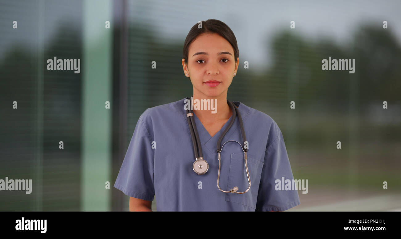 Young Mexican nurse standing in the hallway Stock Photo - Alamy