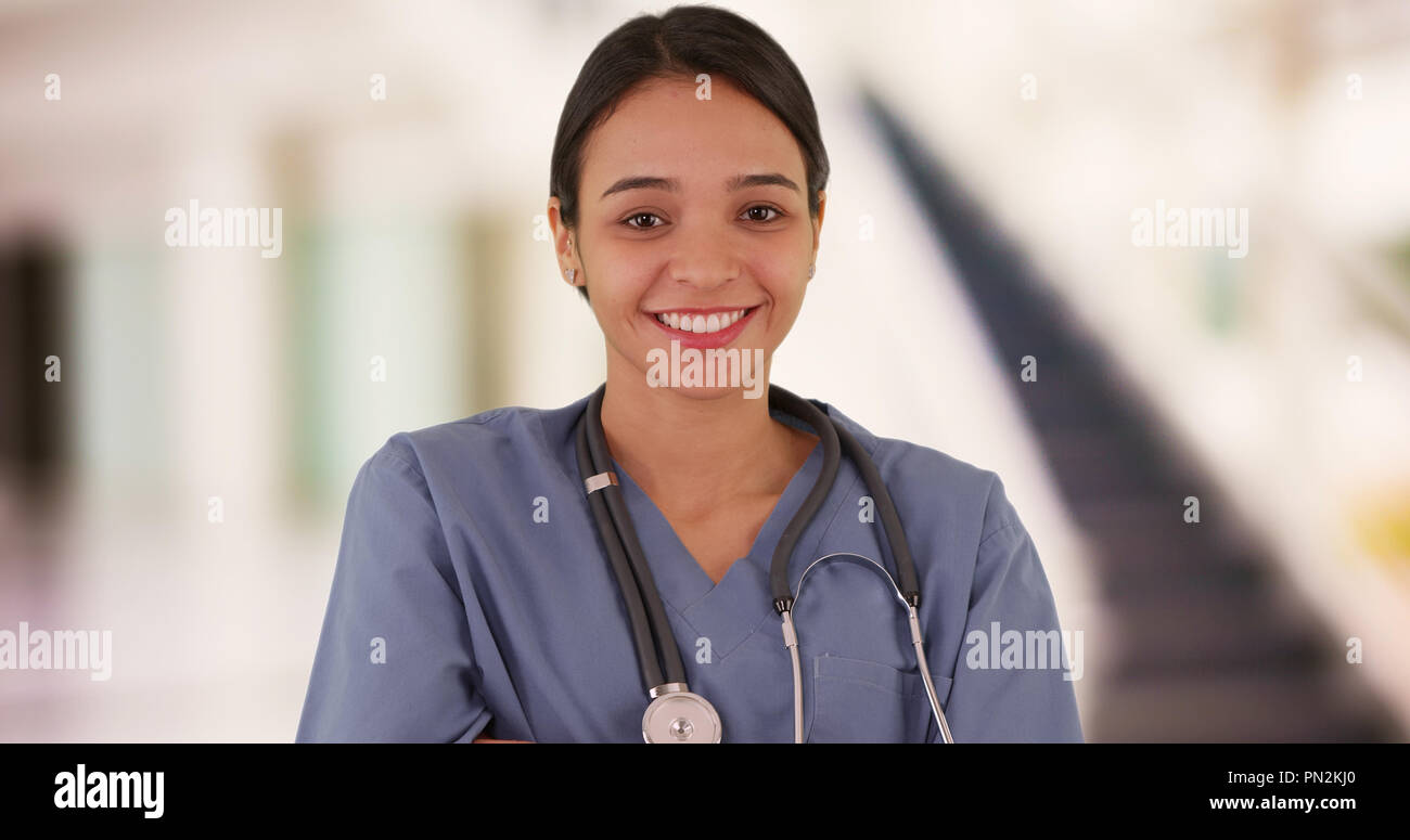 Young Mexican woman intern standing outside hospital Stock Photo - Alamy