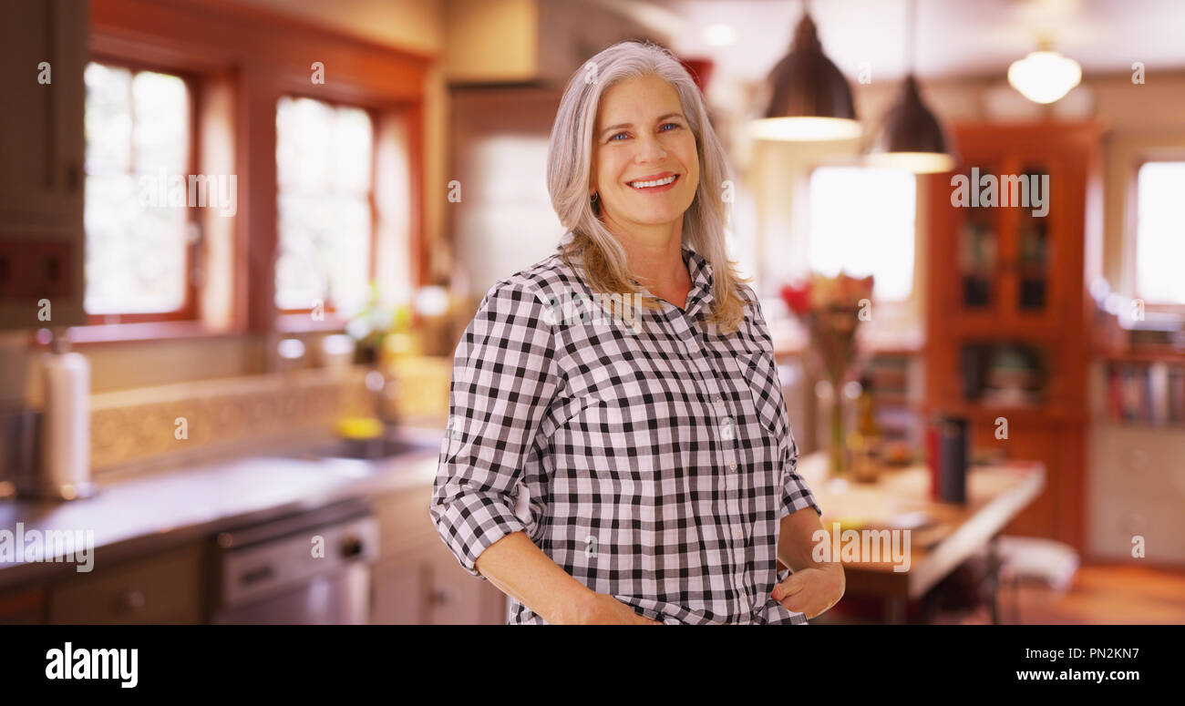 Charming mid aged woman modeling hi-res stock photography and images ...