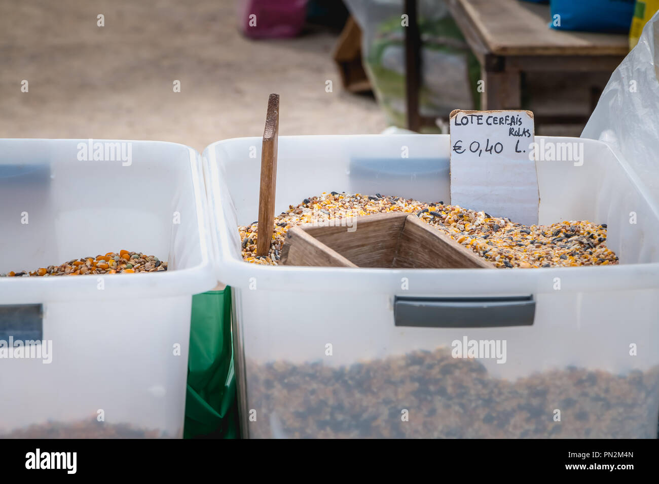 view of bulk cereal bin on a street market in Portugal Stock Photo - Alamy