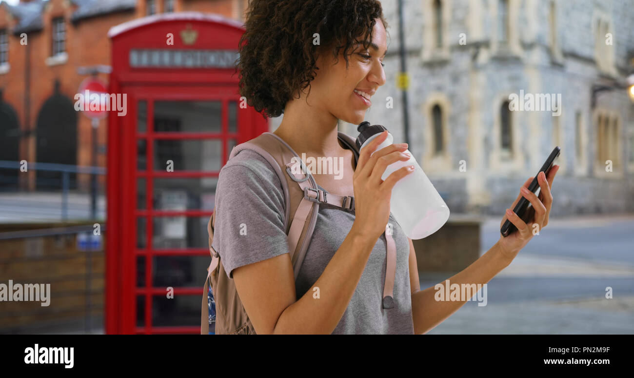 Cute smiling young tourist on urban street in London Stock Photo - Alamy