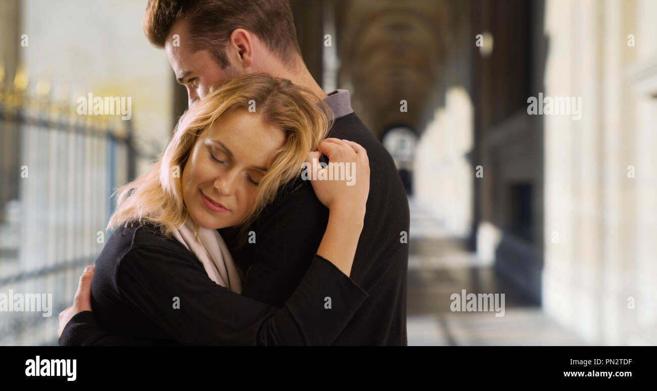 Pretty Caucasian woman hugging her boyfriend Stock Photo - Alamy Pretty Caucasian woman hugging her boyfriend Stock Photo - Alamy