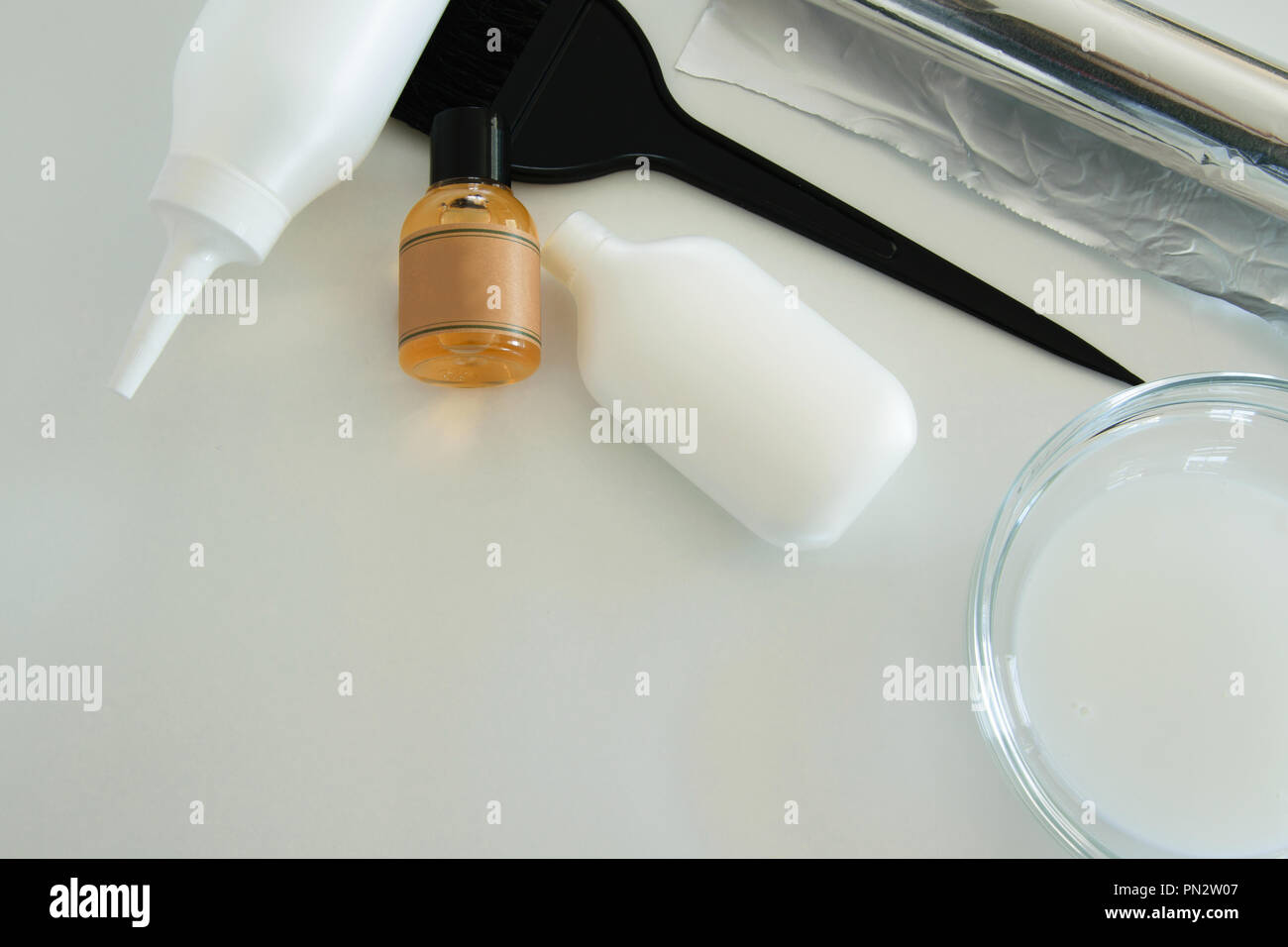 Hair dye tools on white background, space for text Stock Photo - Alamy