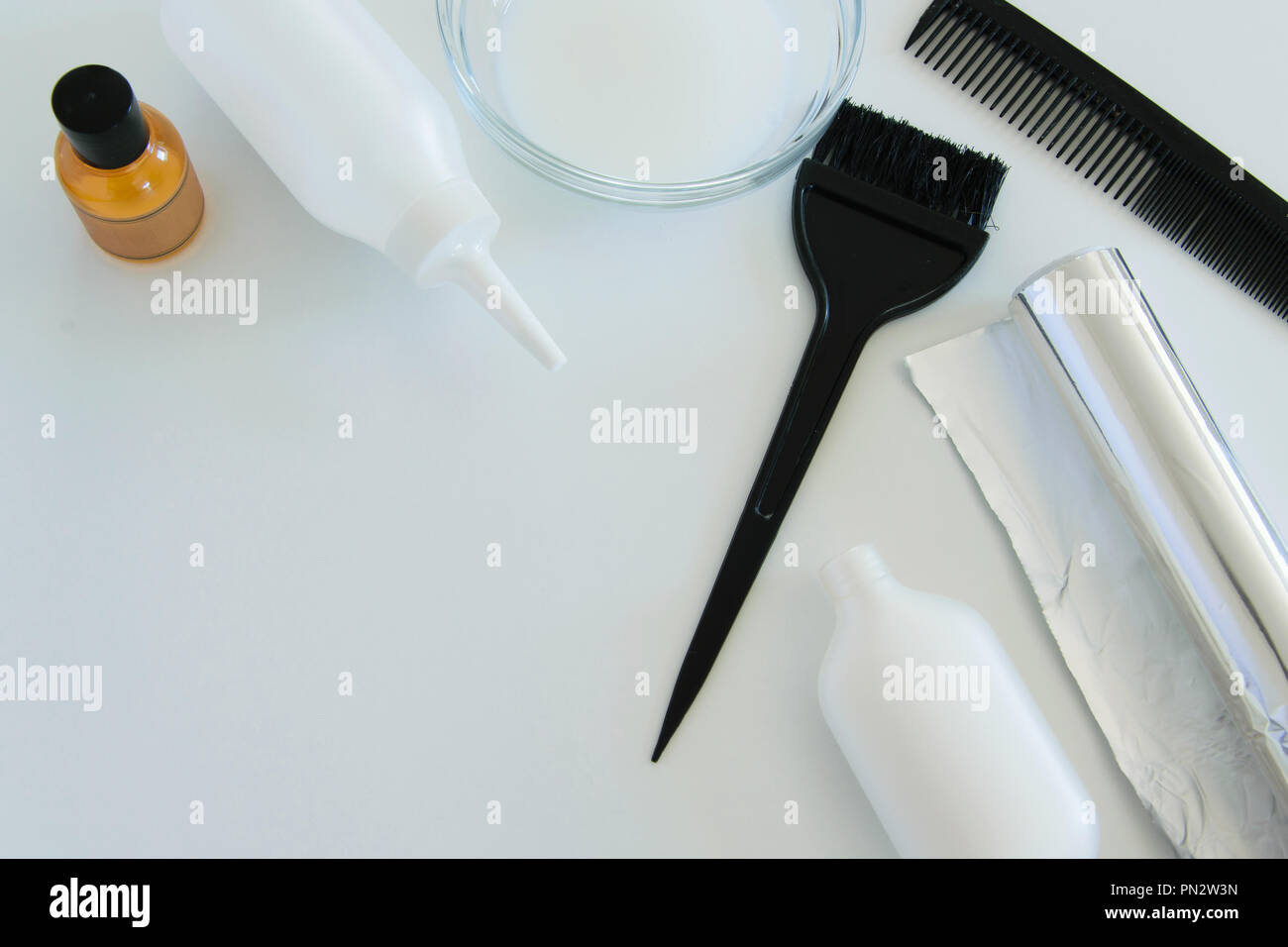 Hair dye tools on white background, space for text Stock Photo - Alamy