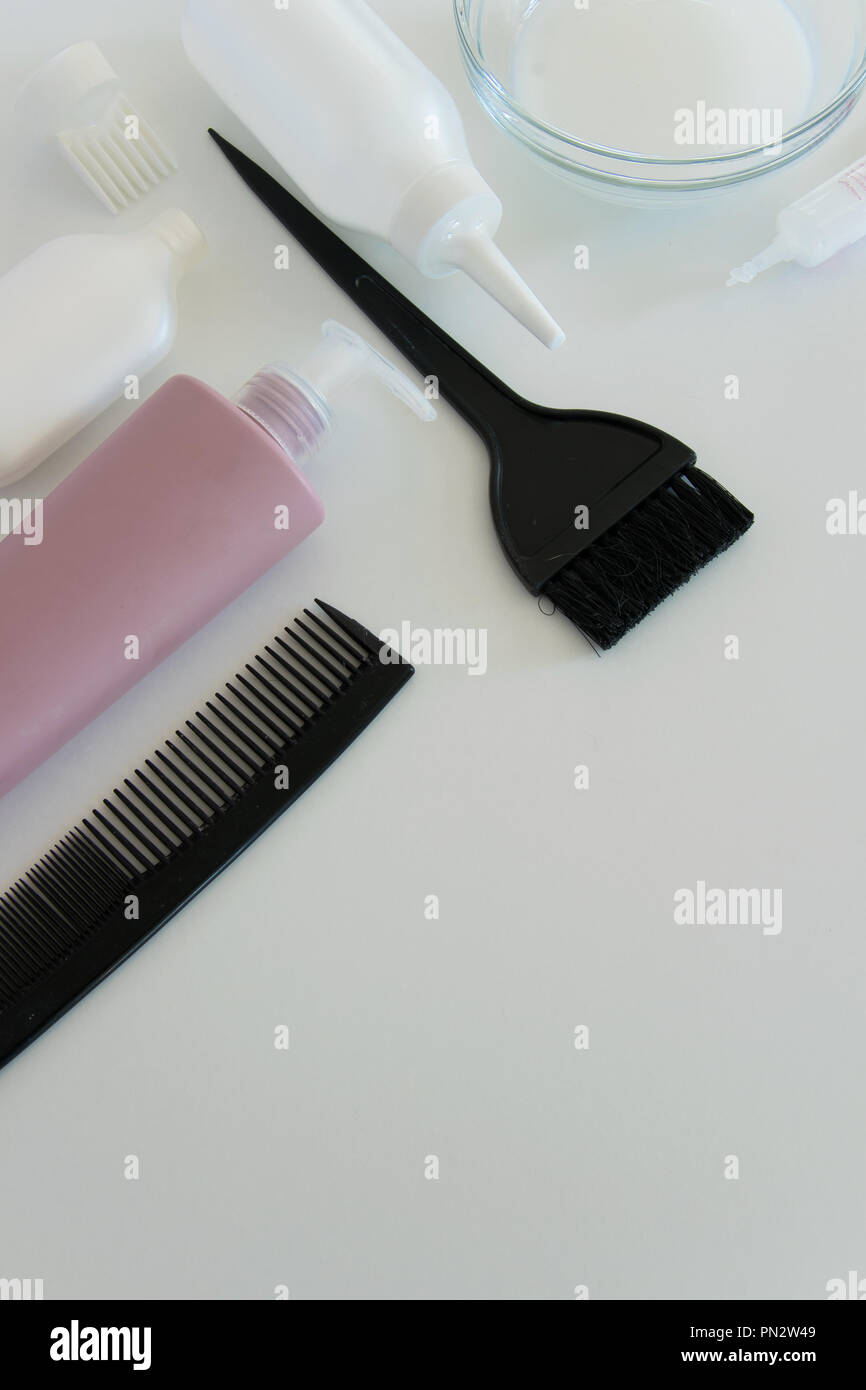 Hair dye tools on white background, space for text Stock Photo - Alamy