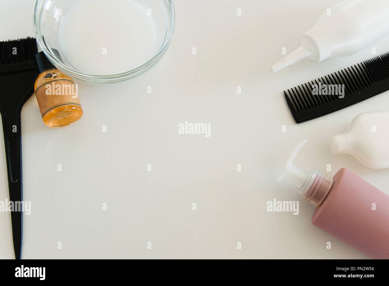 Hair dye tools on white background, space for text Stock Photo - Alamy