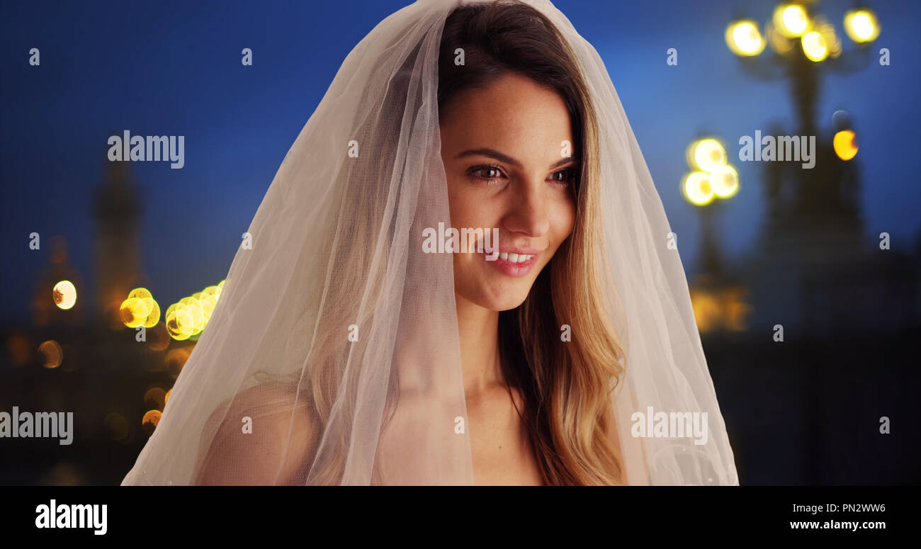 Close up portrait of blushing bride in Paris Stock Photo - Alamy