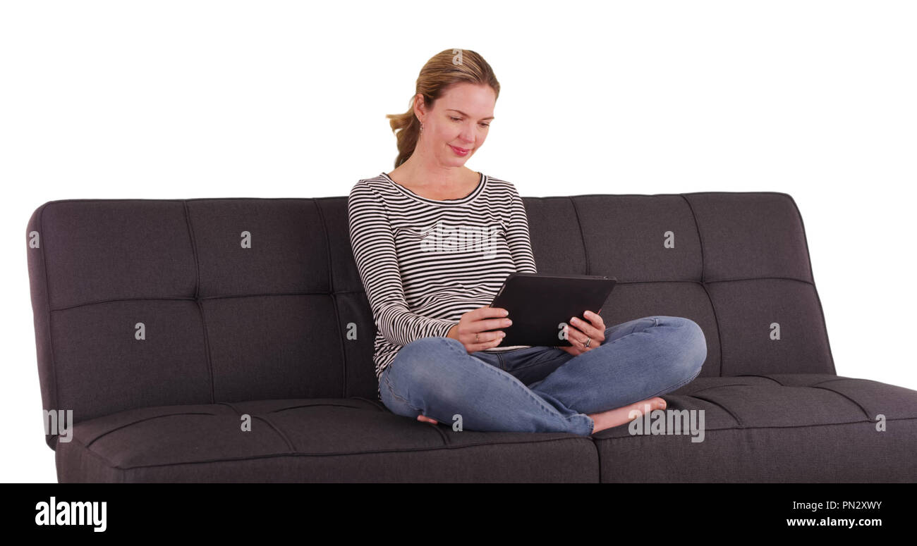 Person tablet seated white room hi-res stock photography and images - Alamy