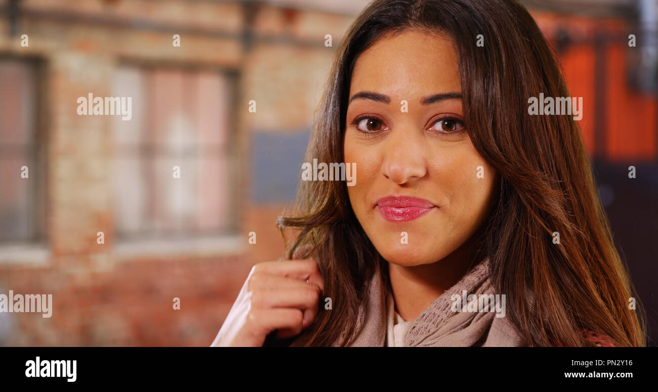 Laughing spanish female standing hi-res stock photography and images ...