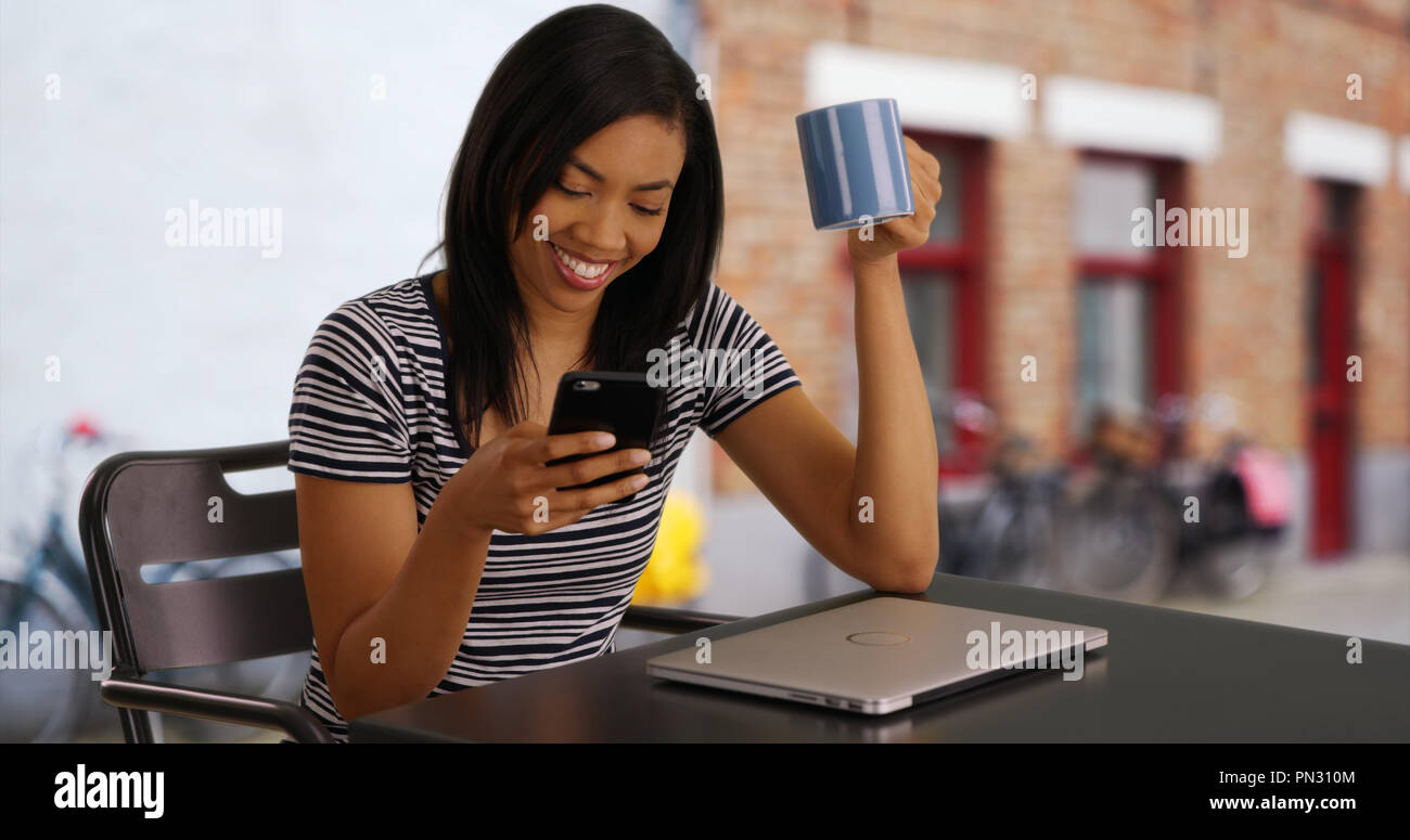 Cheerful black woman taking hi-res stock photography and images - Alamy