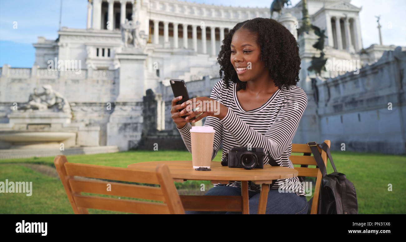 Black girl texting sitting table hi-res stock photography and images ...