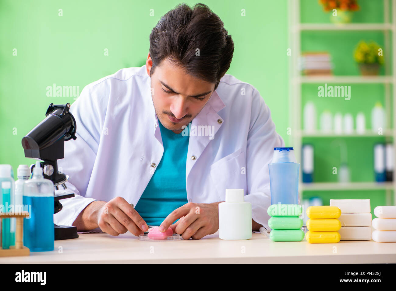 Chemist testing soap in the lab Stock Photo - Alamy
