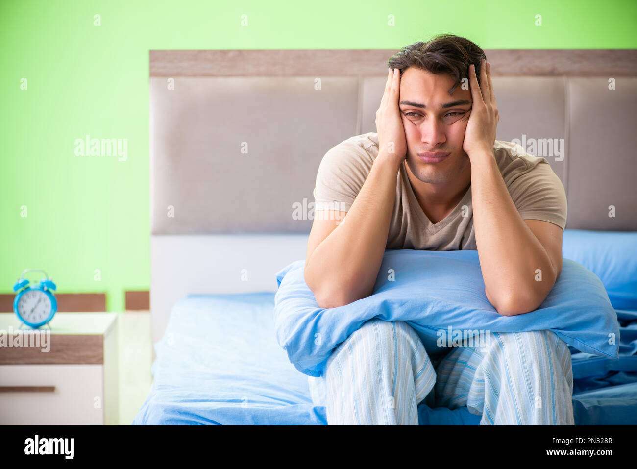 Man suffering from sleeping disorder and insomnia Stock Photo - Alamy