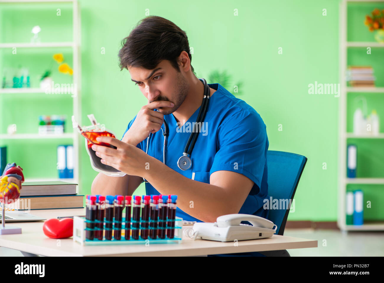 Doctor doing blood analysis in the lab Stock Photo - Alamy