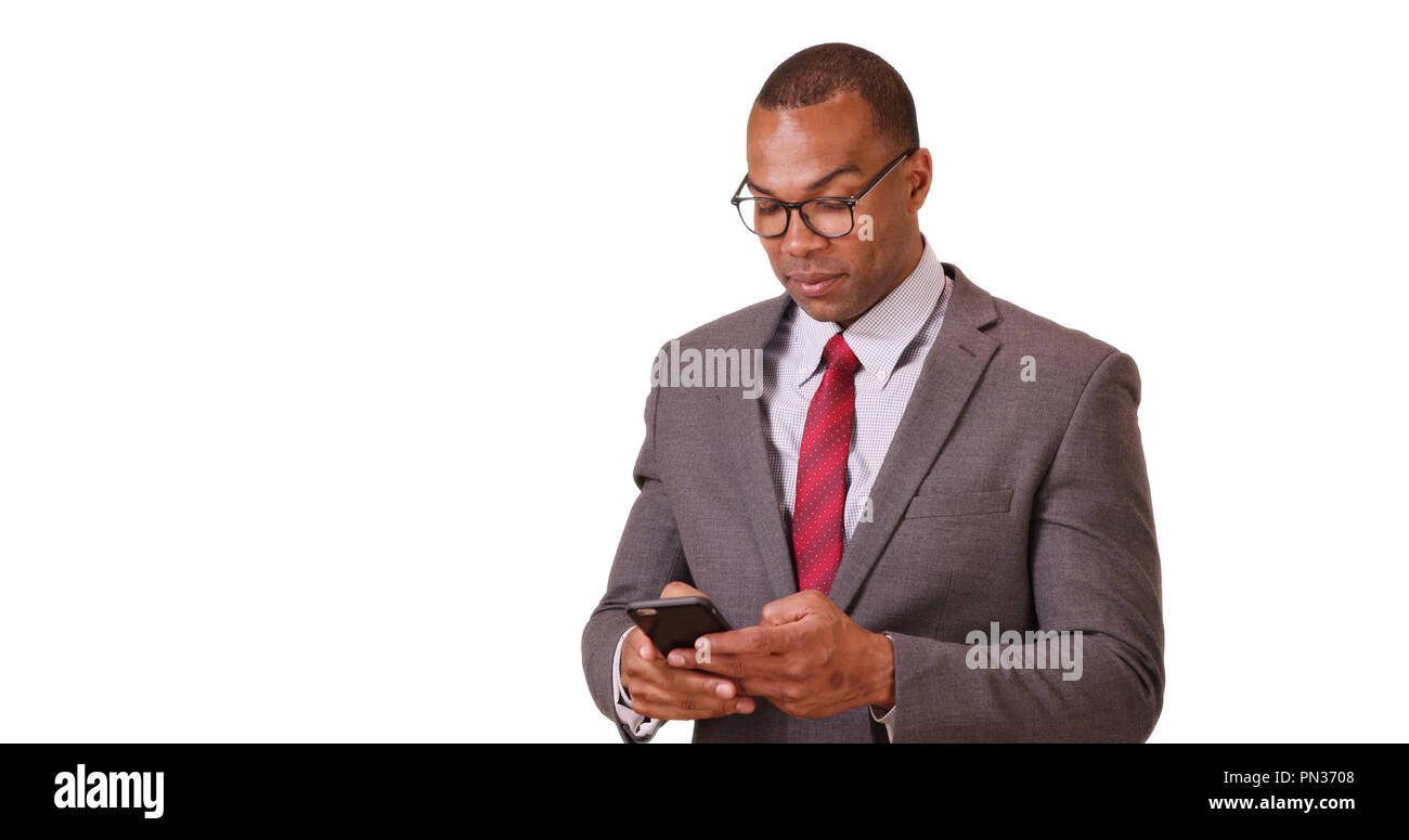 Black man uses mobile phone hi-res stock photography and images - Alamy