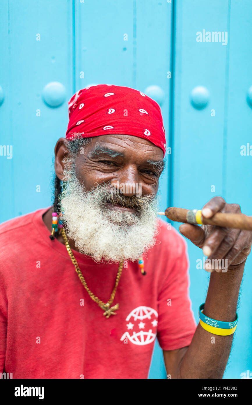 Cuban man smoking cigar, Havana, Cuba Stock Photo - Alamy