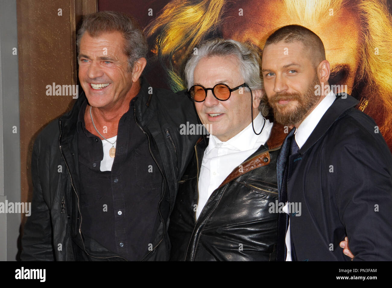 Mel Gibson, George Miller and Tom Hardy at the Premiere of Warner Bros ...