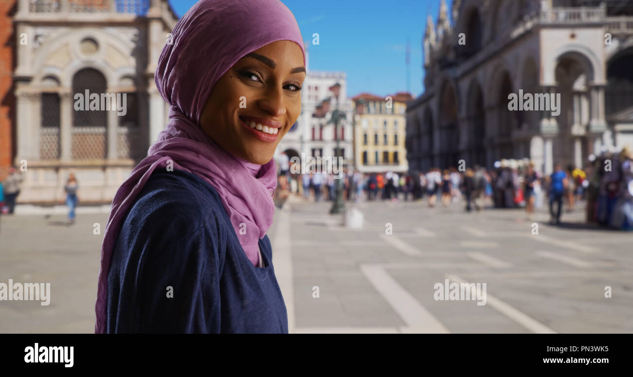 Beautiful smiling young Muslim woman sightseeing in Venice Italy Stock ...