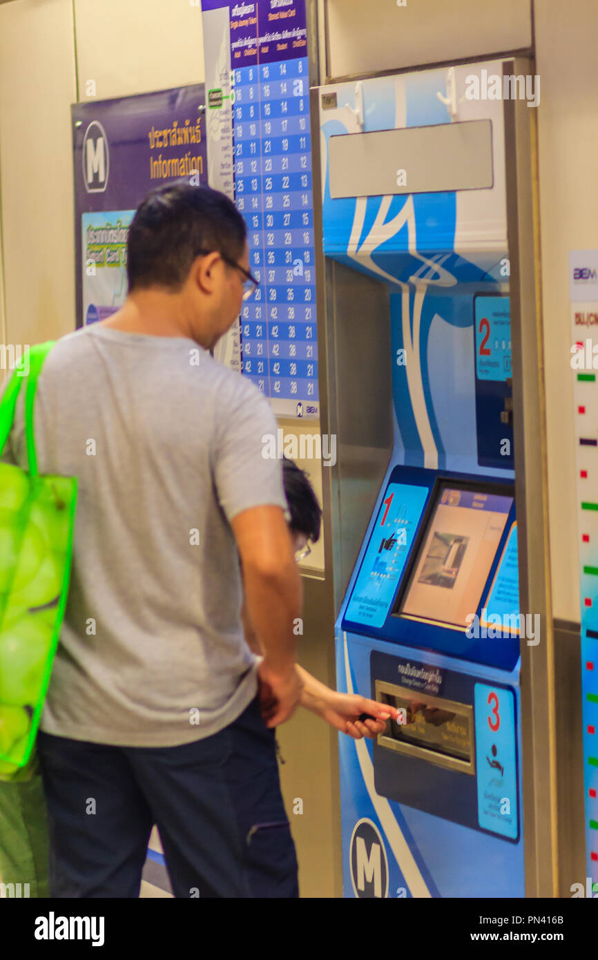 Bangkok, Thailand - April 23, 2017: Unidentified passenger buying a ...