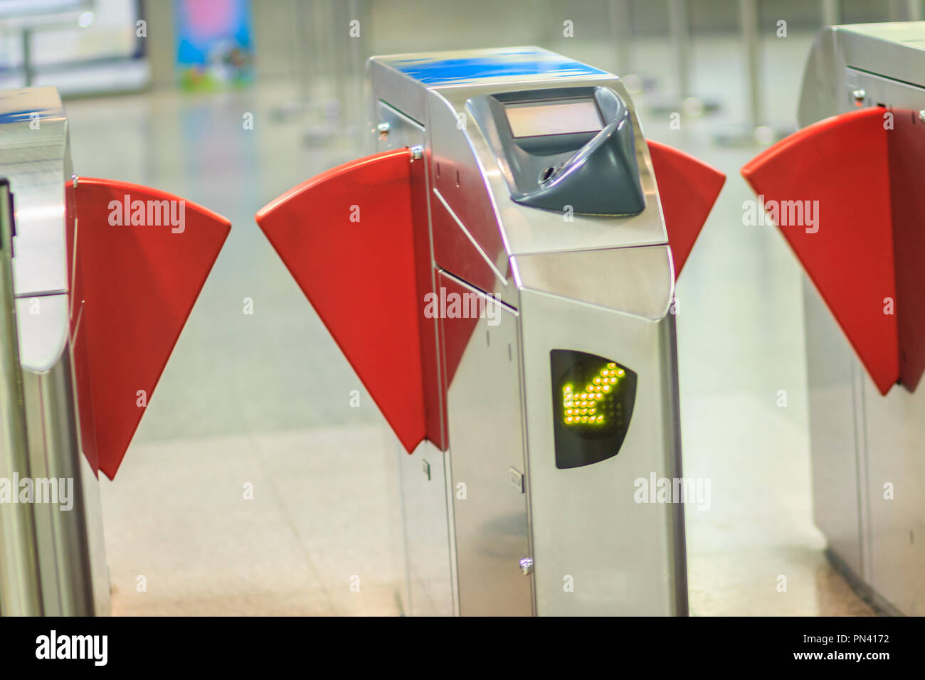 Automatic access control ticket barriers in subway station. View of ...