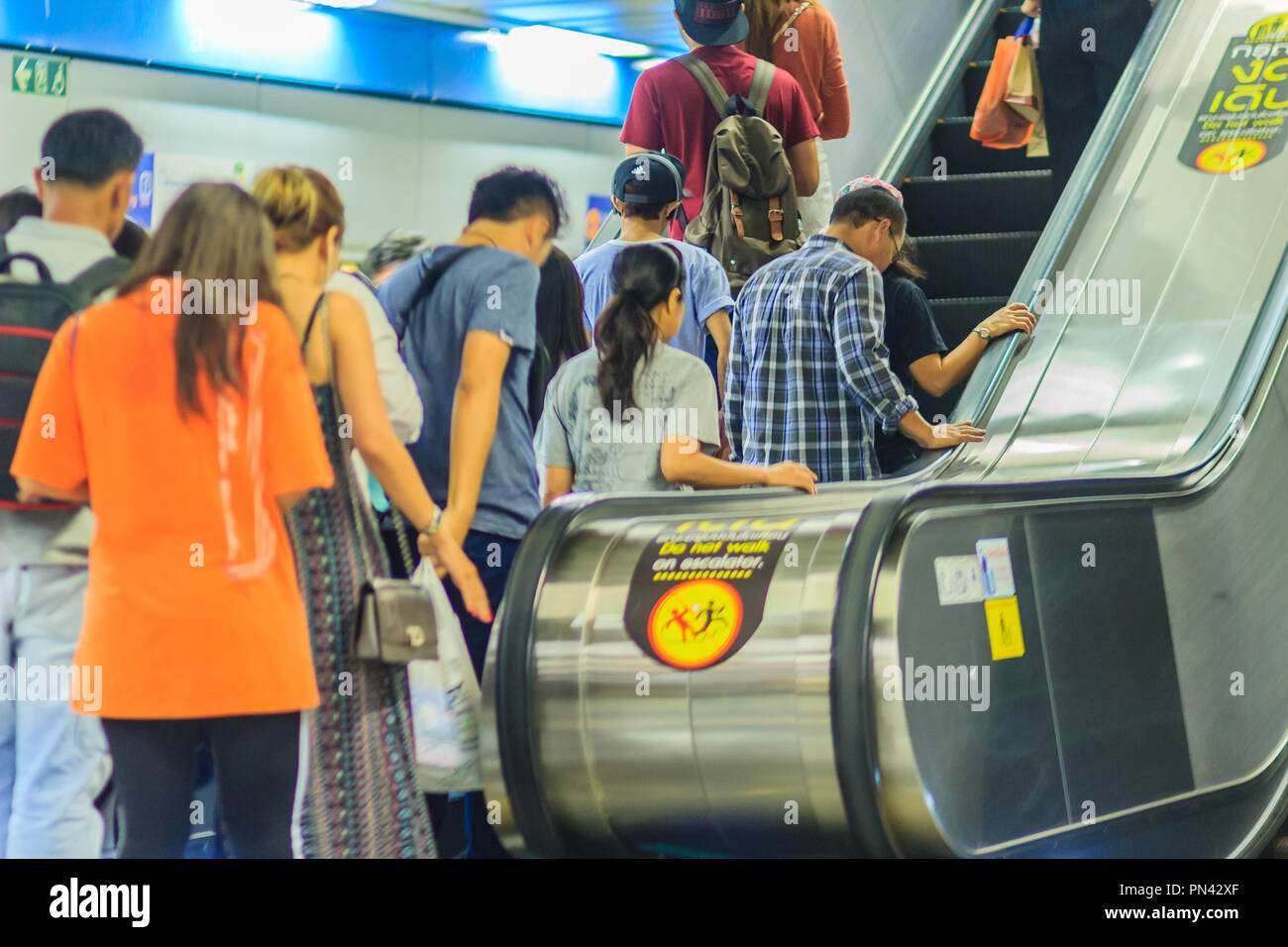 Leaving the modern automatic staircase hi-res stock photography and ...