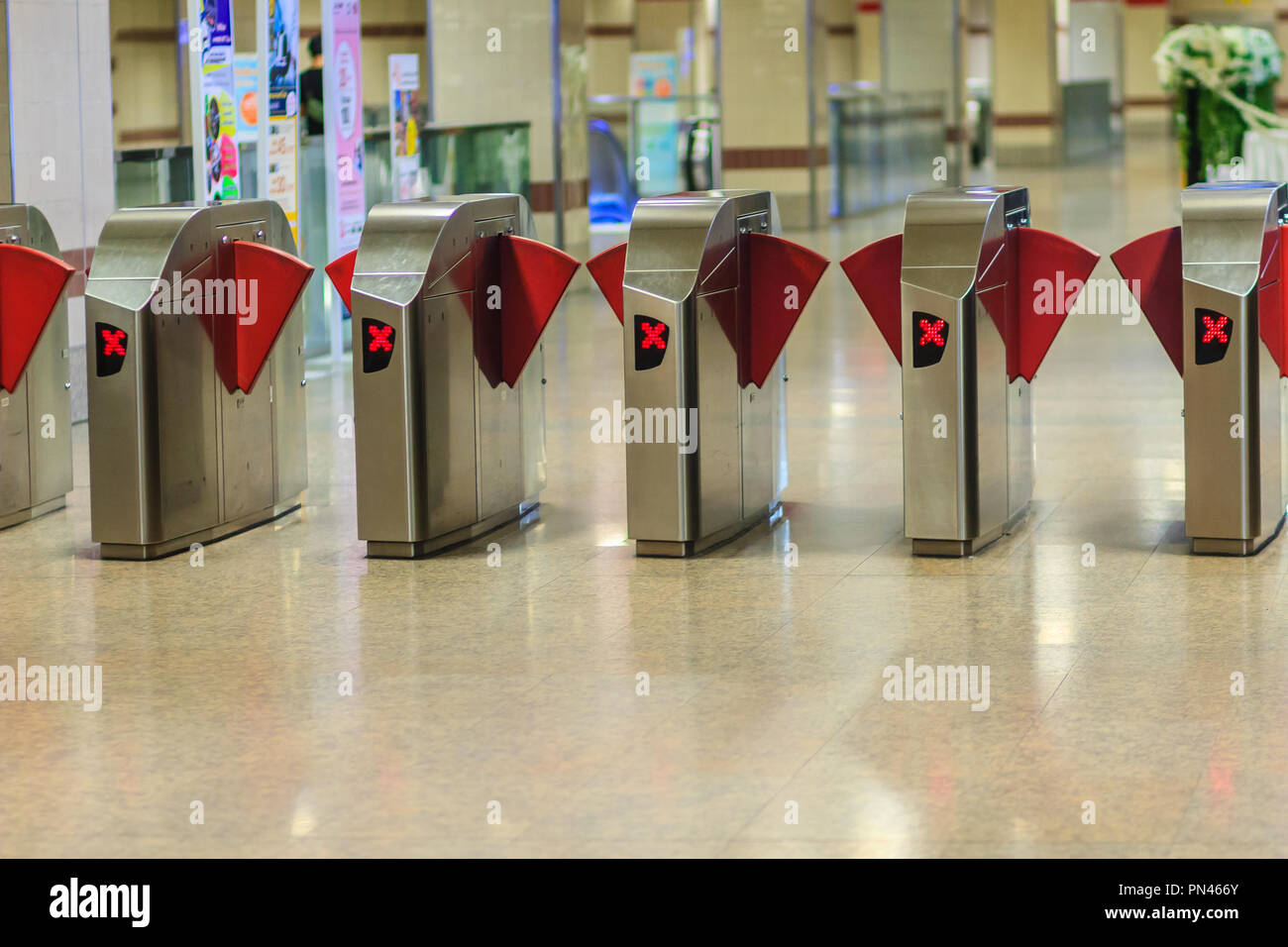 Automatic access control ticket barriers in subway station. View of ...