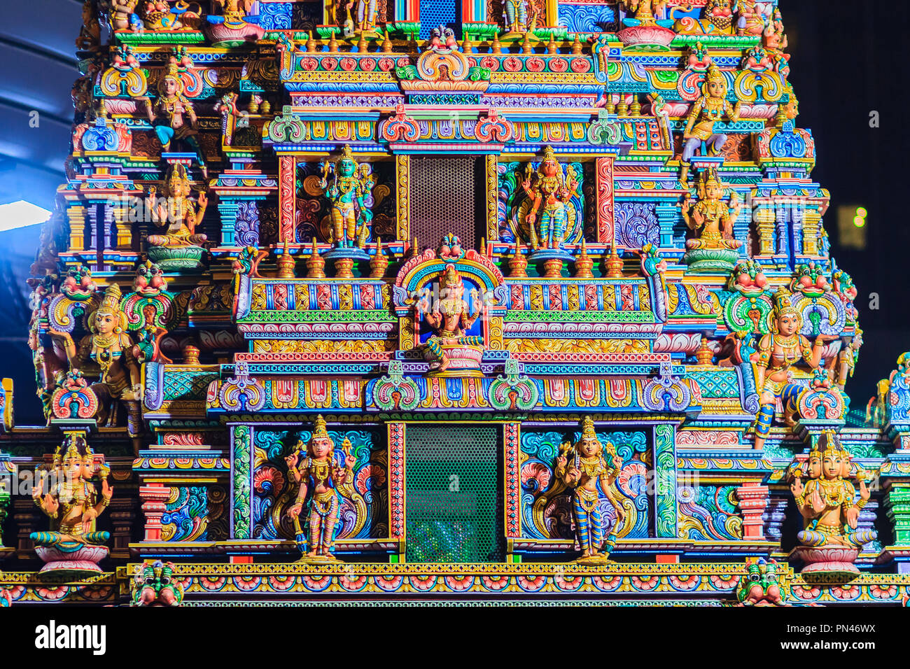 Colorful night view of indian gods sculpture at Sri Maha Mariamman ...