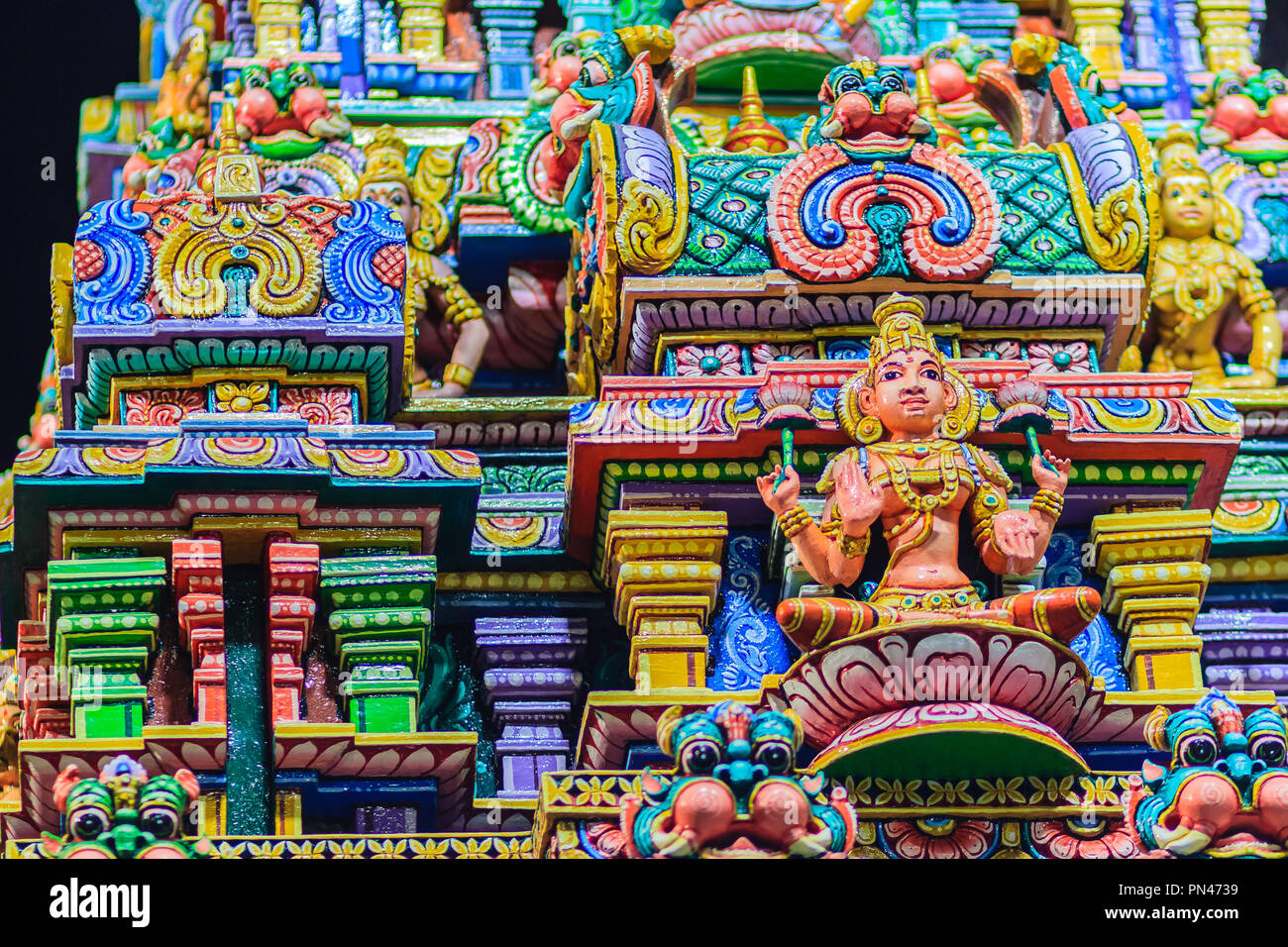 Colorful night view of indian gods sculpture at Sri Maha Mariamman ...