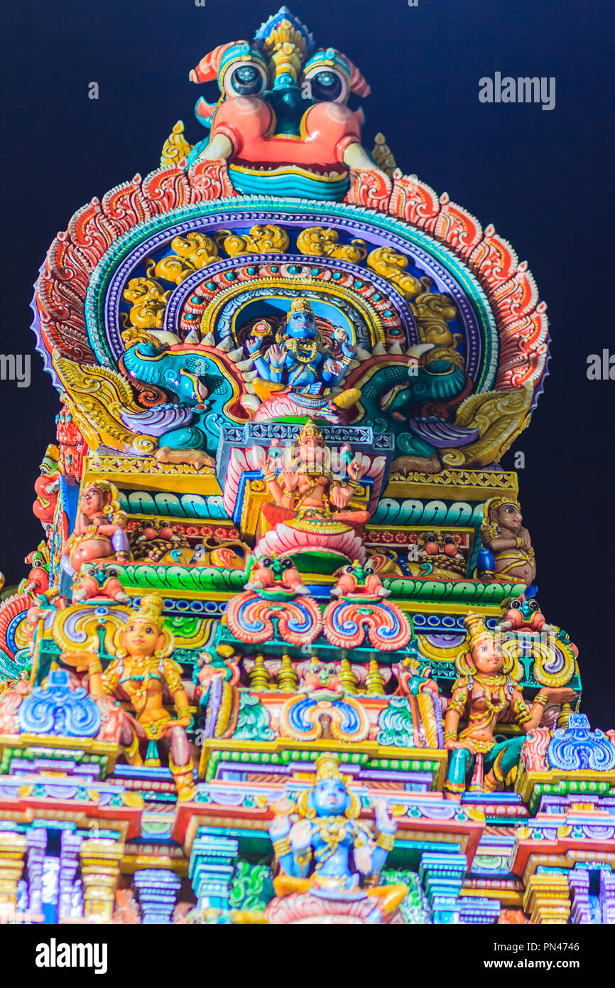 Colorful night view of indian gods sculpture at Sri Maha Mariamman ...