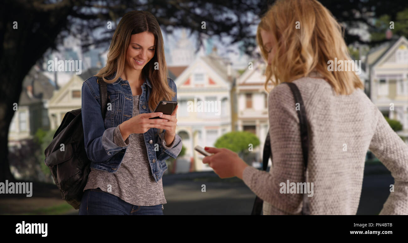 Attractive women using mobile phones hi-res stock photography and ...